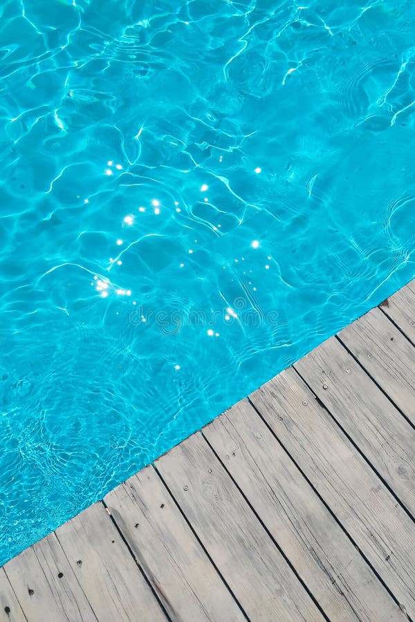 Azure Transparent Texture of Water in a Blue Pool with Splashes from ...