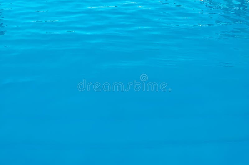 Azure Transparent Texture of Water in a Blue Pool with Splashes from ...
