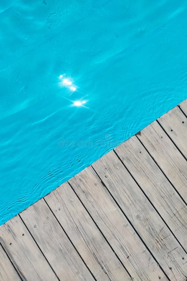 Azure Transparent Texture of Water in a Blue Pool with Splashes from ...