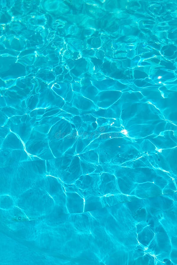Azure Transparent Texture of Water in a Blue Pool with Splashes from ...