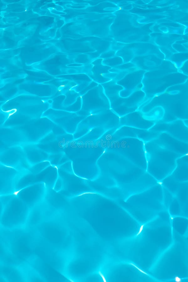 Azure Transparent Texture of Water in a Blue Pool with Splashes from ...