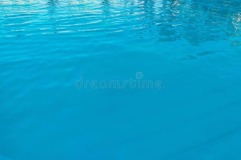 Azure Transparent Texture of Water in a Blue Pool with Splashes from ...