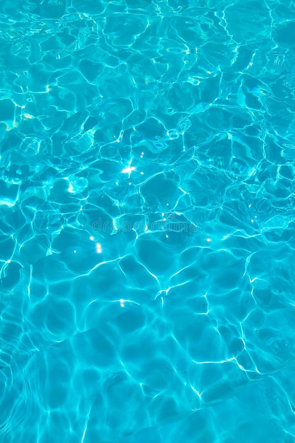 Azure Transparent Texture of Water in a Blue Pool with Splashes from ...