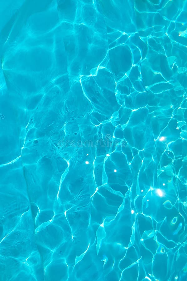 Azure Transparent Texture of Water in a Blue Pool with Splashes from ...