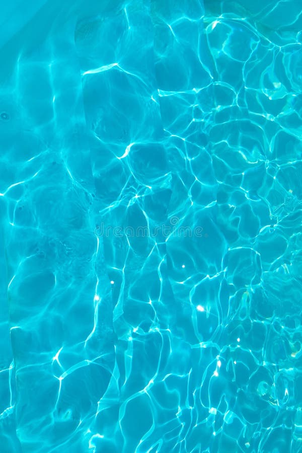 Azure Transparent Texture of Water in a Blue Pool with Splashes from ...