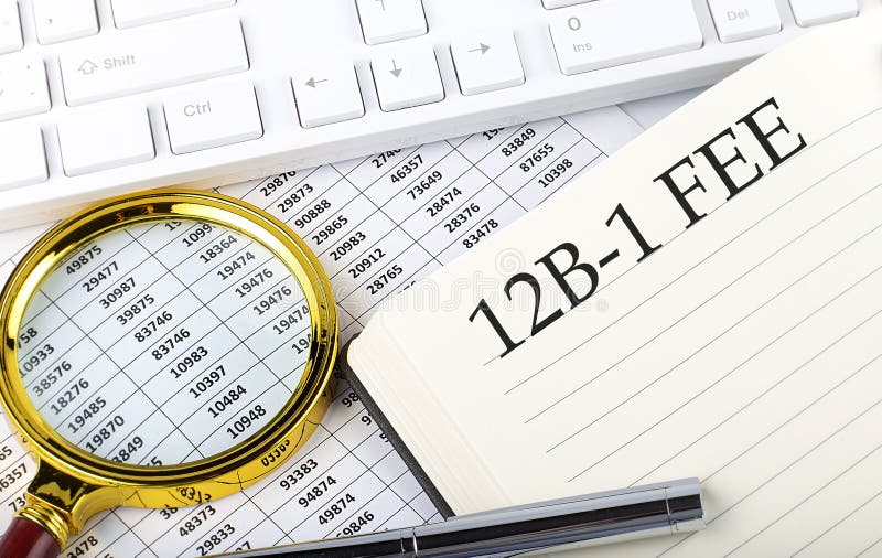 12B -1 FEE Text on the Notebook with Chart, Magnifier,keyboard and Pen ...