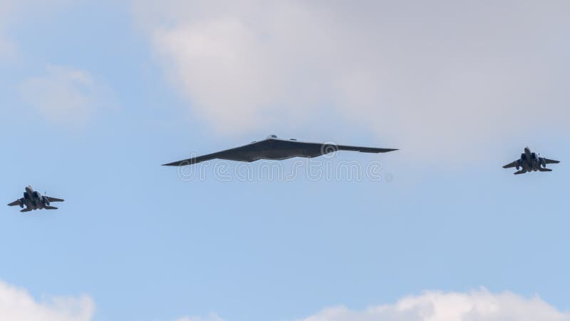 B2 Stealth Bomber in Formation with Two F-15 Aircraft Editorial Photo ...