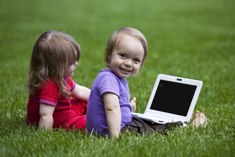 Babies with Notebook stock photo. Image of development - 15116544