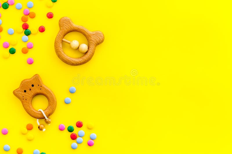 Baby Accessories and Toys on Yellow Table Top-down Copy Space Stock ...
