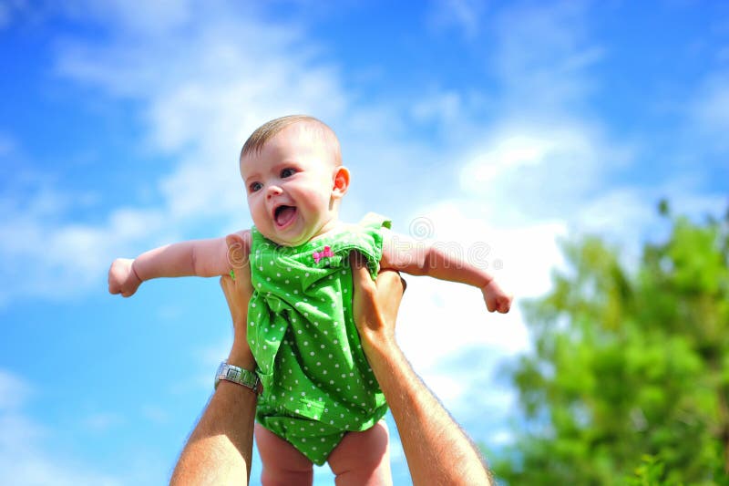 Baby in the air stock photo. Image of park, mouth, looking - 16915116