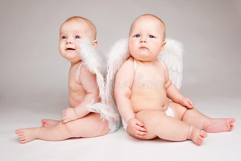 Baby with Angels Wings on Clouds Stock Photo - Image of large, sunlight ...