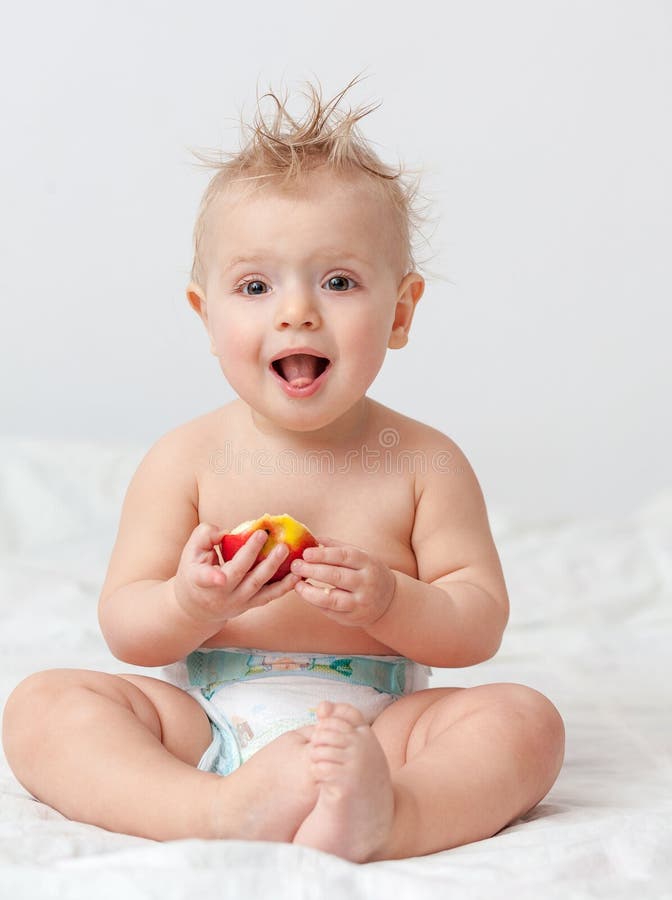 Baby with apple stock image. Image of healthy, cute, face - 26412791