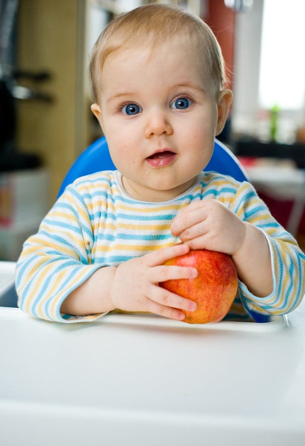 Baby with an Apple at Home; Vertical Stock Image - Image of baby, apple ...