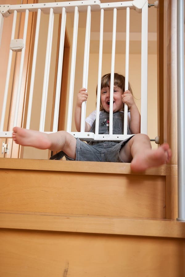 Baby and the stair gate stock photo. Image of staircase - 36489842