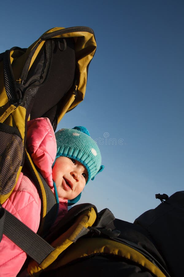 Baby in backpack carrier stock photo. Image of backpack - 66875898