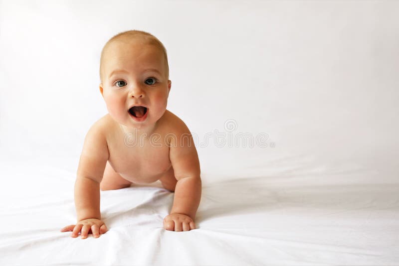 Baby on the bad stock photo. Image of adorable, happy - 154543356