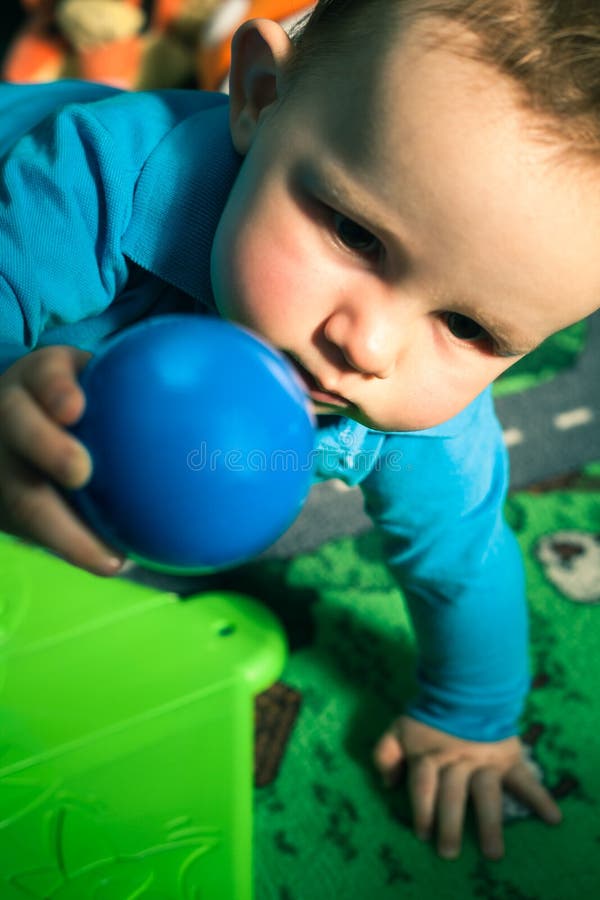 Baby with ball stock image. Image of baby, explore, adorable - 44630841