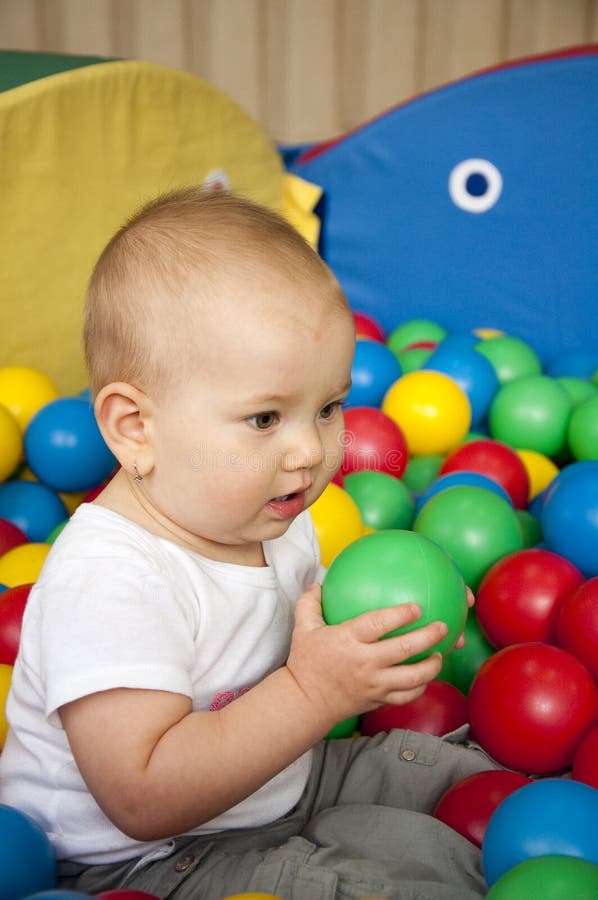 Baby in balls stock image. Image of balls, ball, children - 14282729