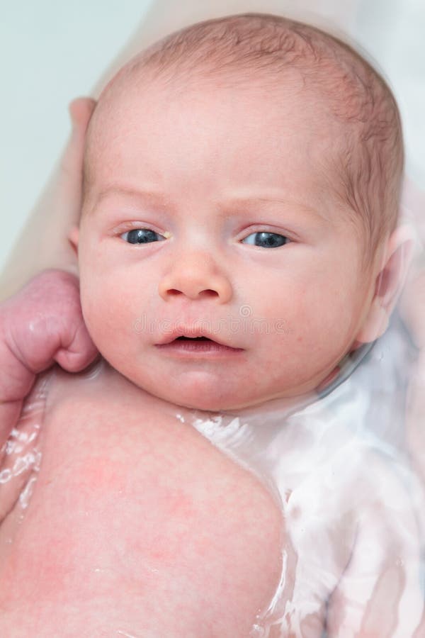 Baby bath time stock image. Image of parenting, calm - 25471979
