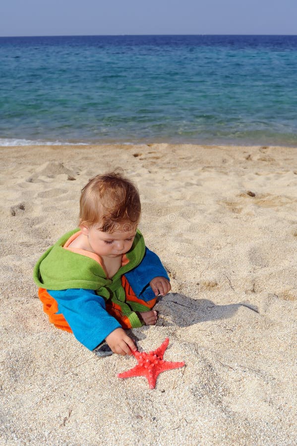 Baby on beach stock image. Image of halkidiki, cute, sithonia - 18991535
