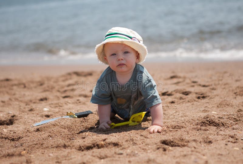 Baby on the beach stock image. Image of beach, girl, kids - 26564827