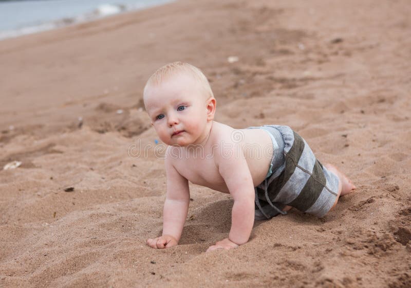 Baby on the beach stock image. Image of beach, girl, kids - 26564827