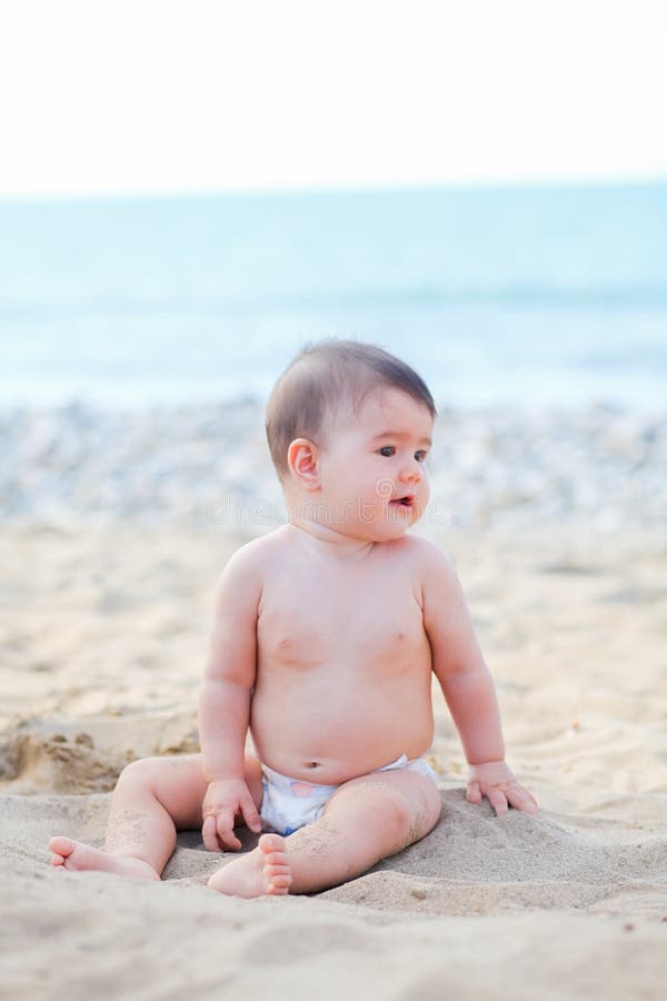 Baby on the beach stock image. Image of adorable, childhood - 22771711