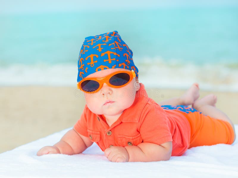 Baby on the beach stock image. Image of nature, conceptual - 34699911