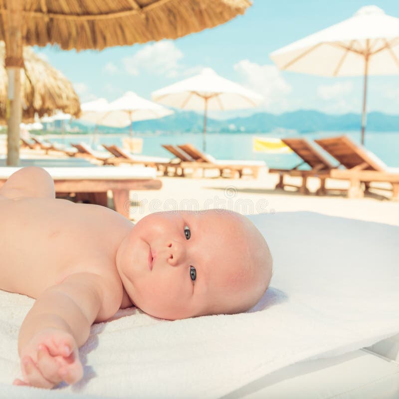 Baby on the beach stock image. Image of nature, conceptual - 34699911
