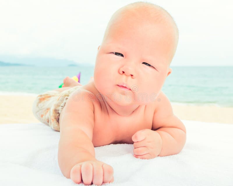 Baby on the beach stock photo. Image of caucasian, happy - 35616762