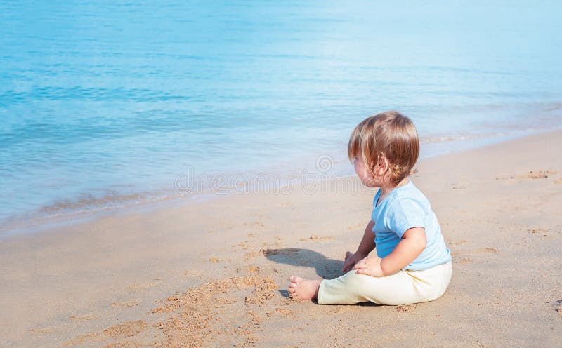 Baby on the beach stock image. Image of 1217, beach - 244941159