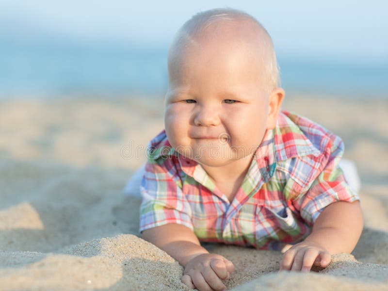 Baby on the beach stock image. Image of peaceful, beautiful - 34699921