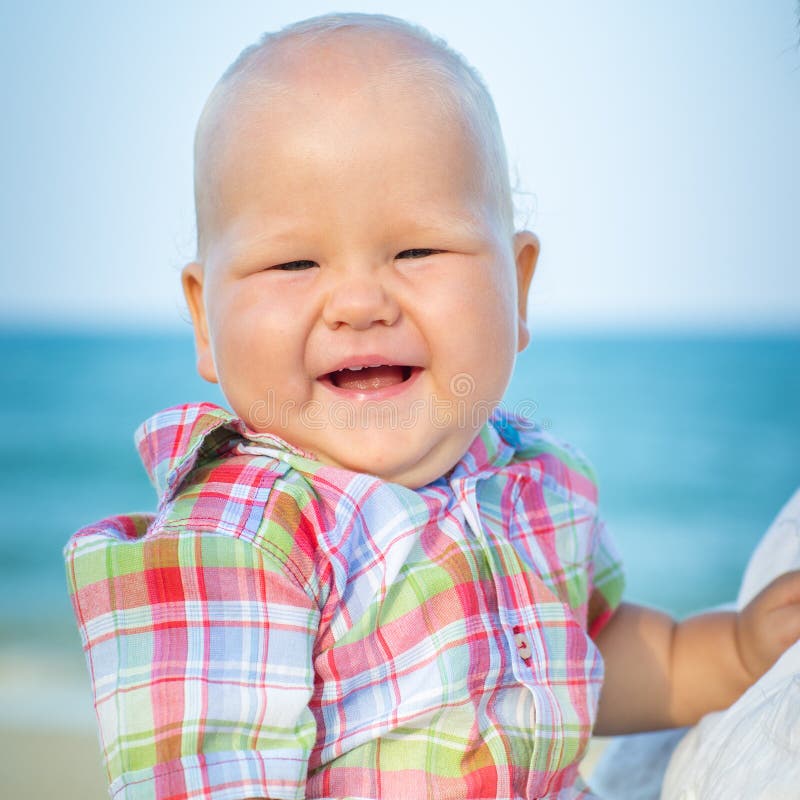 Baby on the beach stock image. Image of shore, baby, little - 40684139