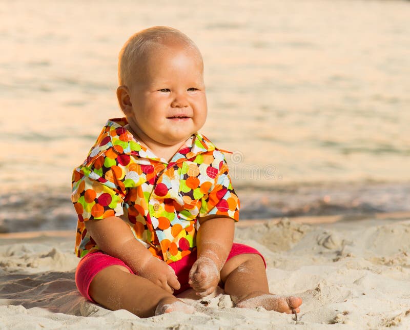 Baby on the beach stock image. Image of childhood, lifestyle - 33950027