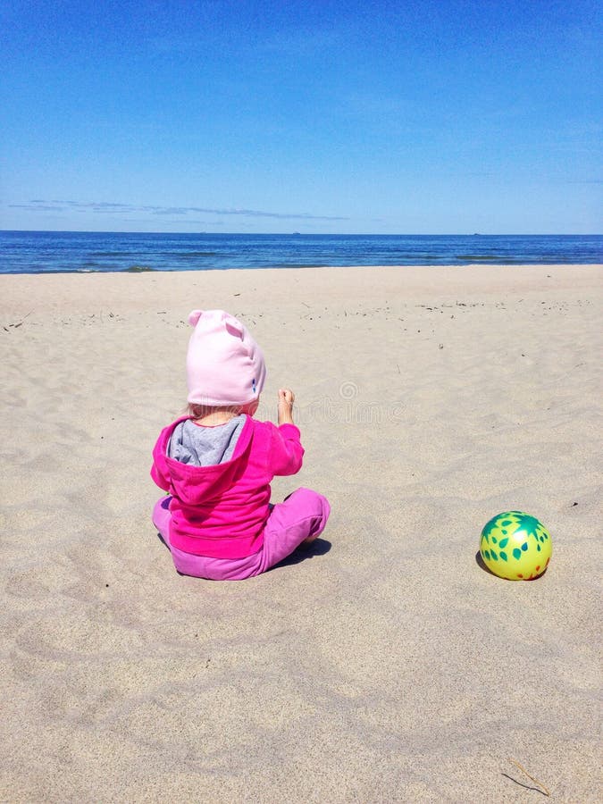 Baby on the beach editorial stock photo. Image of summer - 72738943