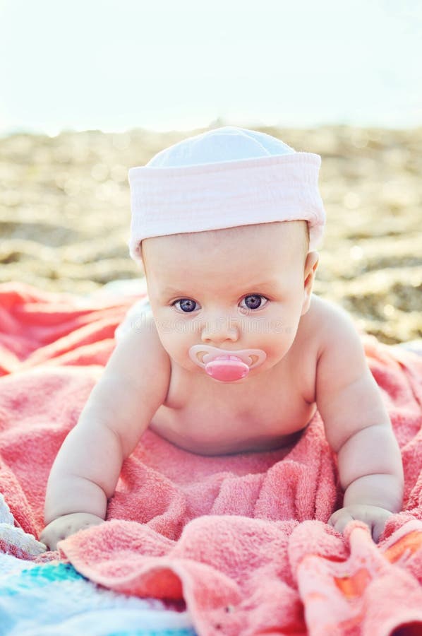 Baby on the beach stock photo. Image of innocence, closeup - 32240602