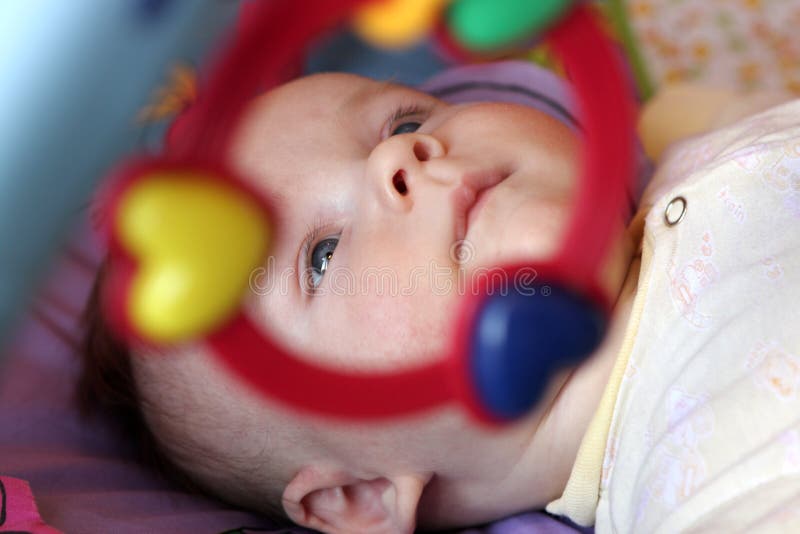 Baby behind toy stock photo. Image of cheerful, caucasian - 15198702