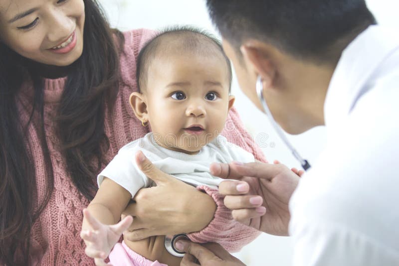 Baby Being Checked by a Doctor Stock Image - Image of family, childcare ...