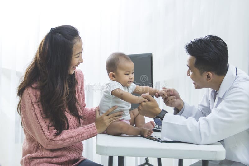 Baby Being Checked by a Doctor Stock Photo - Image of male ...
