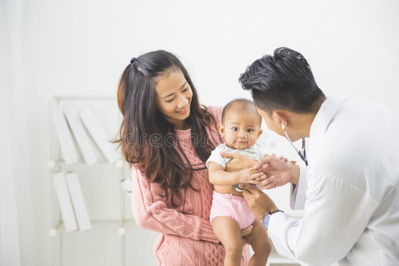 Baby Being Checked by a Doctor Stock Photo - Image of male ...