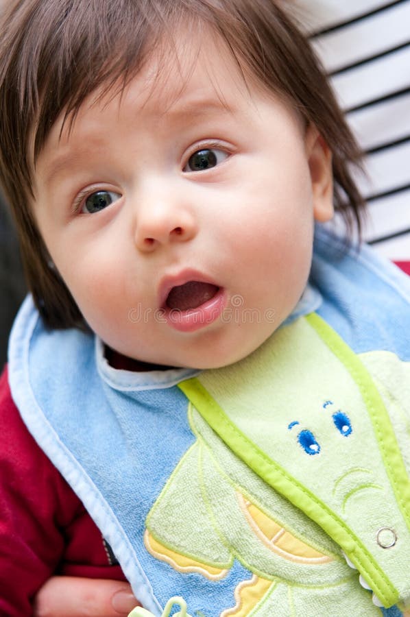 Baby with a bib stock photo. Image of portrait, white - 13466636