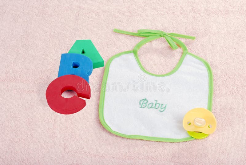 Baby Bib with a B C Letters Stock Photo - Image of maternity, softness ...