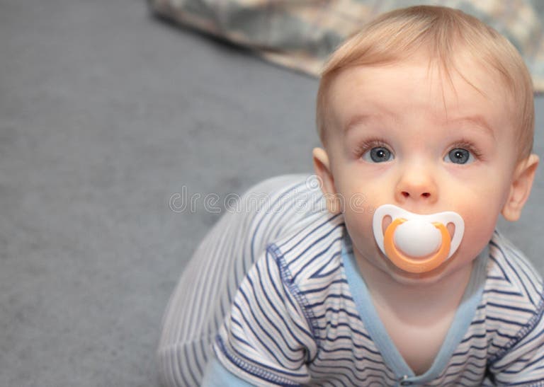Baby and Binky stock photo. Image of expression, alert - 17215490