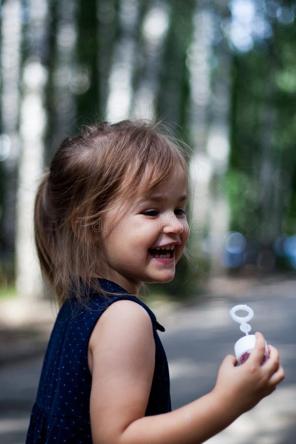 Baby Blowing Bubbles in a Park Stock Image - Image of childhood ...