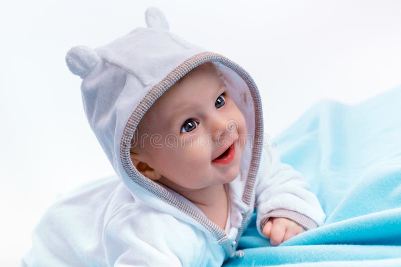 Baby on a blue blanket stock image. Image of adorable - 57044809