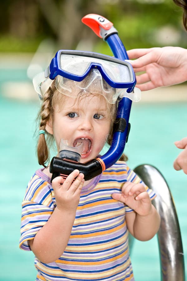 Baby in Blue Diver Mask Leaves Pool. Stock Photo - Image of person ...