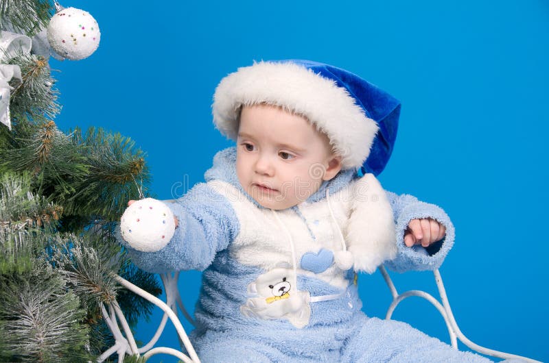 Baby in Blue Santa Claus Hat Imagem de Stock - Imagem de menino, chapéu ...