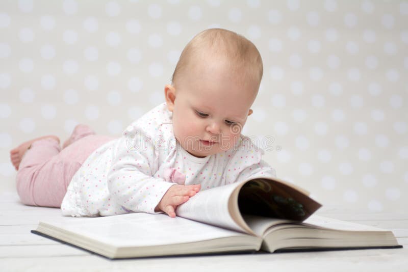Baby with the book stock image. Image of brain, literature - 51602935