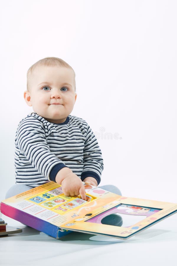 Baby and books stock photo. Image of read, childhood, playing - 7483838