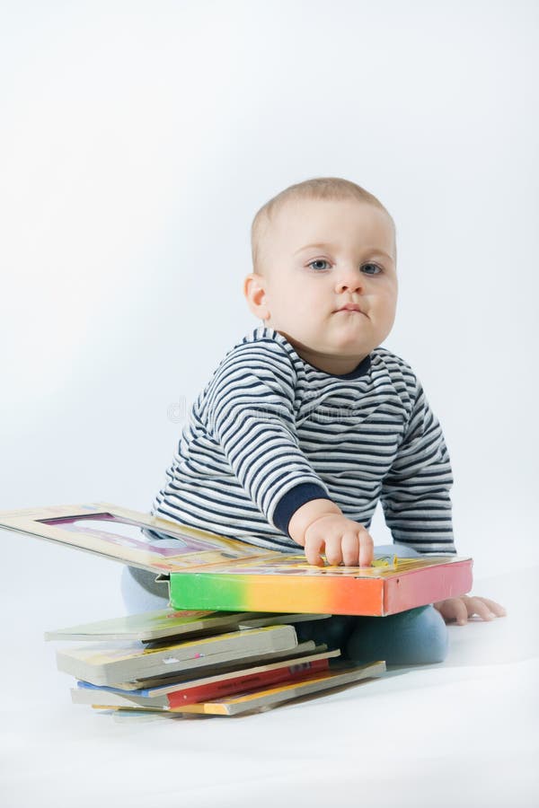 Baby and books stock image. Image of sweet, read, children - 7529283